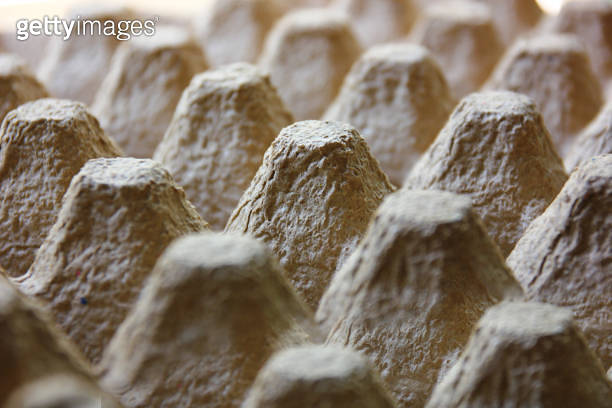 close up old brown paper recycled into egg trays triangle shape ...