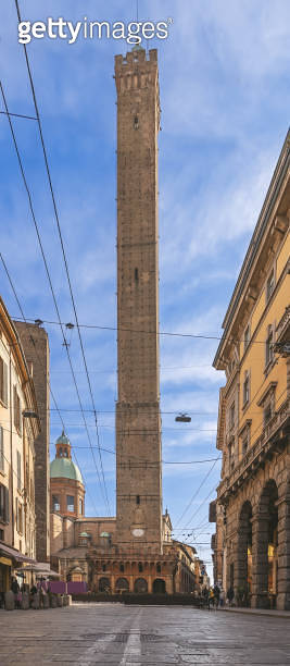 Bologna renowned Asinelli Tower reaches for the sky, captured in a ...