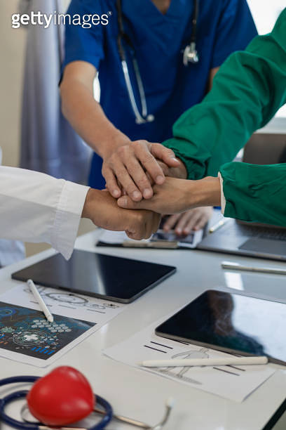 Medical and surgical teams join hands and work together to fight ...