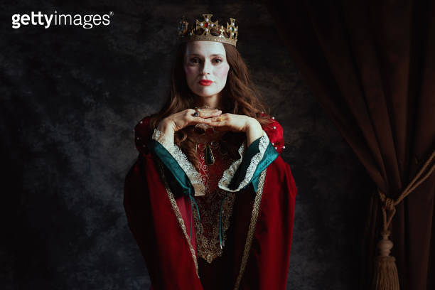 medieval queen in red dress with white makeup and crown (2037790016 ...