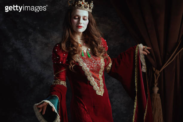 medieval queen in red dress with white makeup and crown (1924520756 ...