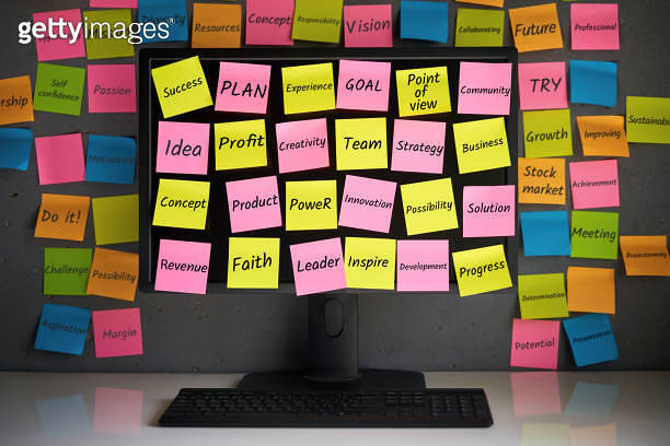 Modern computer monitor full of business motivation quotes on colorful ...