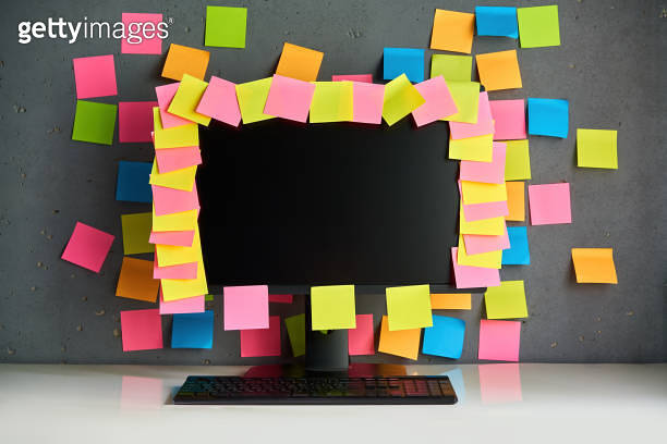 Computer monitor full of blank colorful sticky notes reminders 이미지 ...