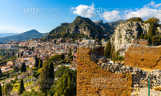 Taormina panorama with Castello Saraceno Saracen Castle on Monte Tauro ...