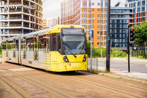 Tram running on segregated tramway along a street 이미지 (2148757221) - 게티 ...
