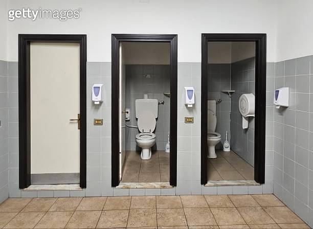 three public toilets, three doors adjacent to three toilets 이미지 ...