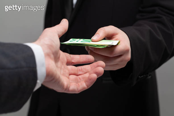 Businessman receiving money from his partner. Money cash euro banknote ...