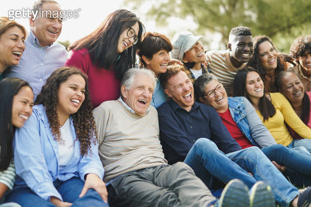 Crowd of multiracial people having fun together at city park - Social ...