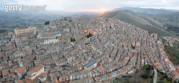 The stunning village of Gangi with Mount Etna volcano at its back in ...