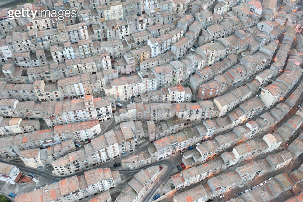 The stunning village of Gangi with Mount Etna volcano at its back in ...
