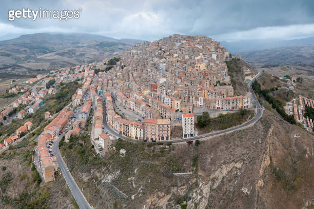 The stunning village of Gangi with Mount Etna volcano at its back in ...