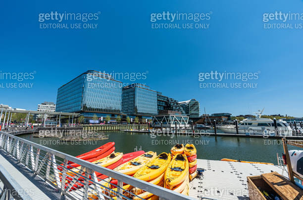 Kayaks and paddleboards rental at recreation pier in the Wharf, modern ...