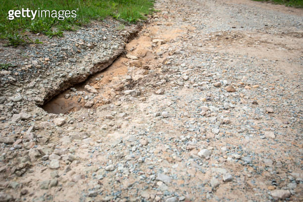 Washed out pothole on the road, deterioration of infrastructure 이미지 ...