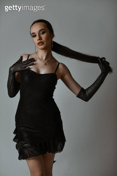 Gothic Female Beauty Playing With Her Long Ponytail 이미지 (2162519765 ...