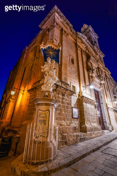 Virgin Mary And Jesus Statue Near St. Paul's Church At Night In Mdina ...