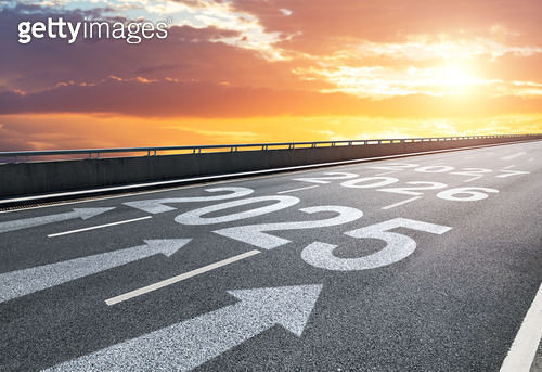 New year 2025, 2026 and 2027 with arrow sign written on highway at ...