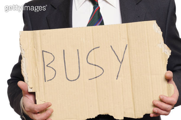 Businessman Holding Busy Sign. 이미지 (2032277657) - 게티이미지뱅크