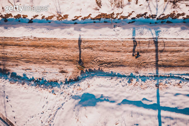 Happy children sledding down the slide, view of children from above ...