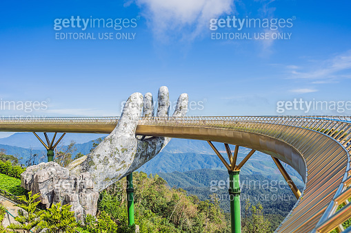 Da Nang, Vietnam:Top aerial view of the famous Golden Bridge is lifted ...