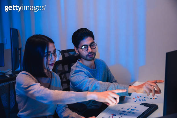 asian and Indian Developer devops team discussion about coding promgram ...