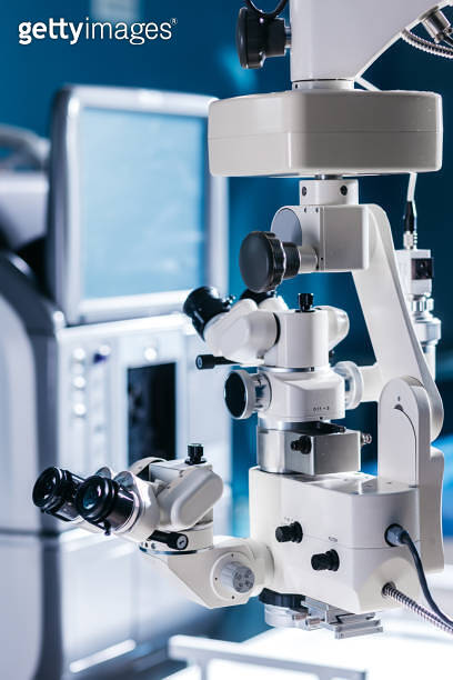 Surgical microscope in the operating room of a modern ophthalmology ...