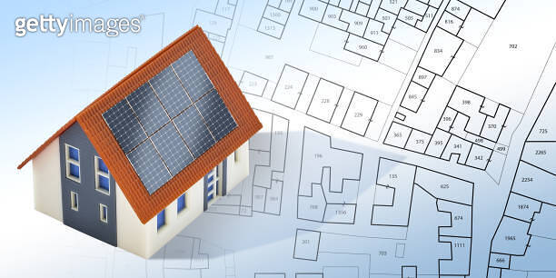 Photovoltaic system installation on a residential building - Building permit concept with home ...