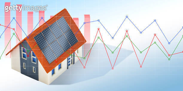Photovoltaic system installation on a residential building - concept with home model and chart ...