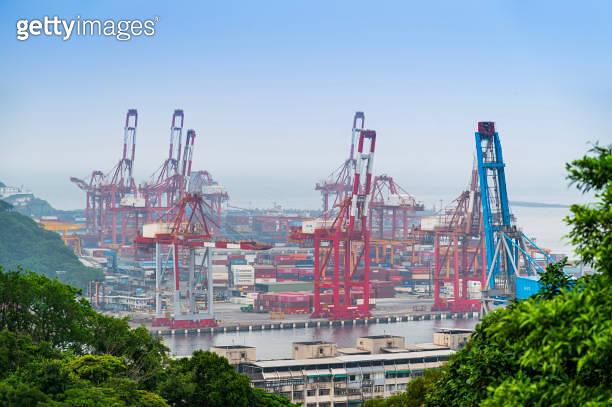Keelung, Taiwan - April 16, 2024 : Port container cranes loading with ...