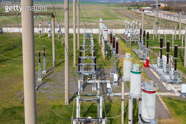 Aerial view of electrical towers and large electrical substation in ...