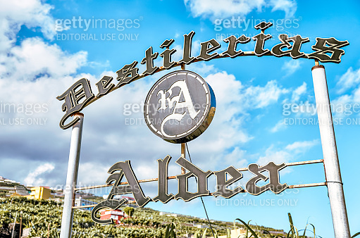 Exterior signage for the Aldea Rum Distillery in the town of Santa Cruz ...