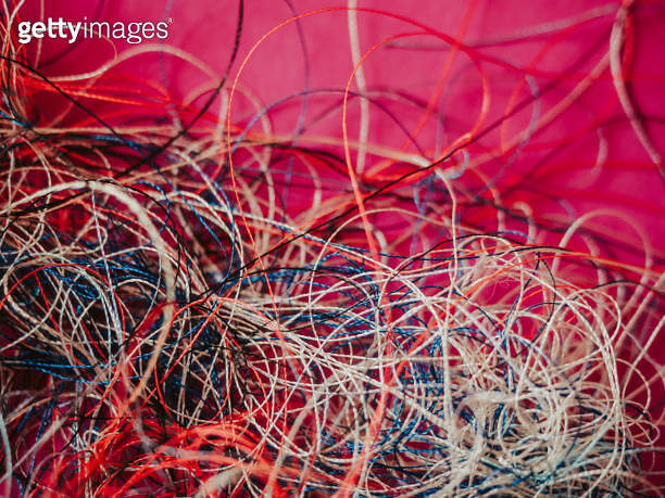 Chaotically tangled threads. Embroidery threads randomly woven. Huge ...