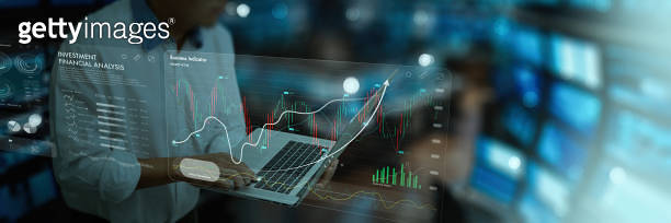 stock market analysts financial professional working with laptop ...