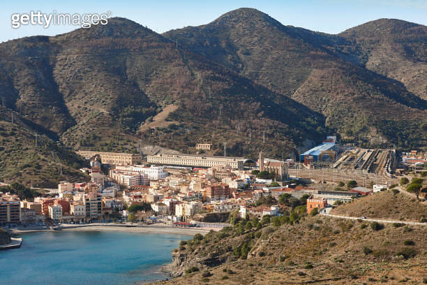 Mediterranean town of Portbou. Beach and railway station. Catalonia ...