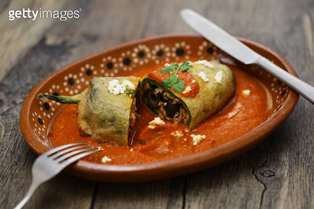 chile relleno (fried poblano pepper stuffed with minced meat and coated ...