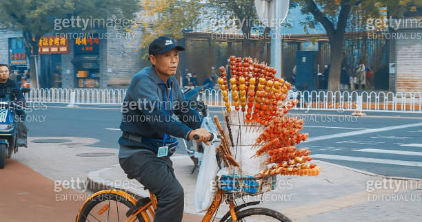 Beijing, China. Man Carries On Bicycle Large Batch Of Tanghulu Made ...