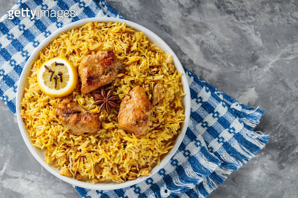 Pakistani and Indian Chicken Biryani Rice with Spices on Gray ...