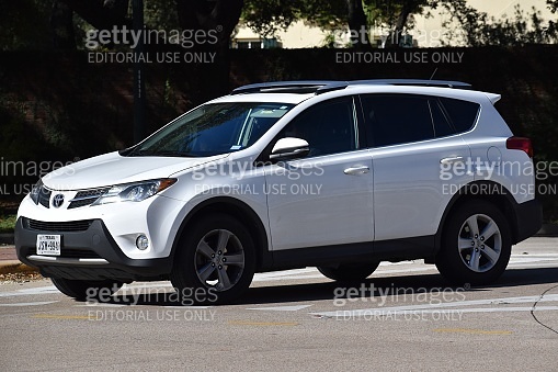 A new white Toyota Rav 4 SUV cruising near Herman Park in Houston 이미지 ...