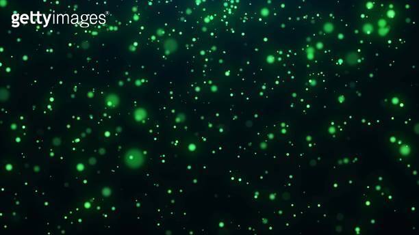 Dust particles with bokeh effect on dark background. Abstract magic ...