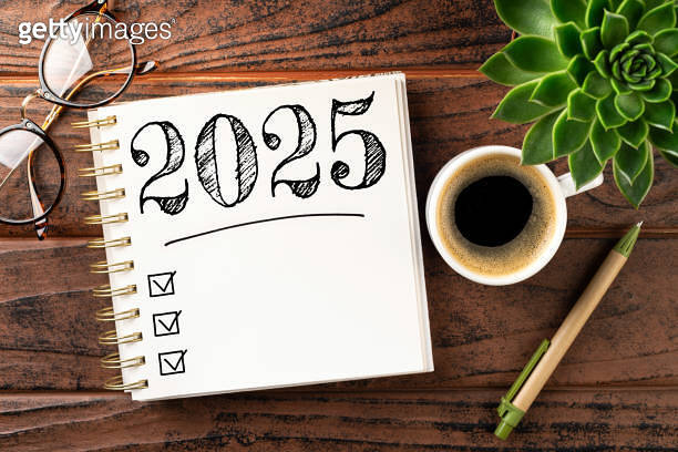 New year resolutions 2025 on desk. 2025 goals list with notebook ...