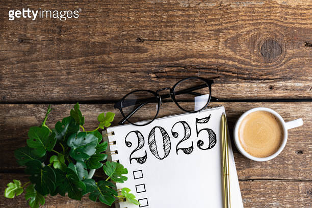 New year resolutions 2025 on desk. 2025 goals list with notebook ...