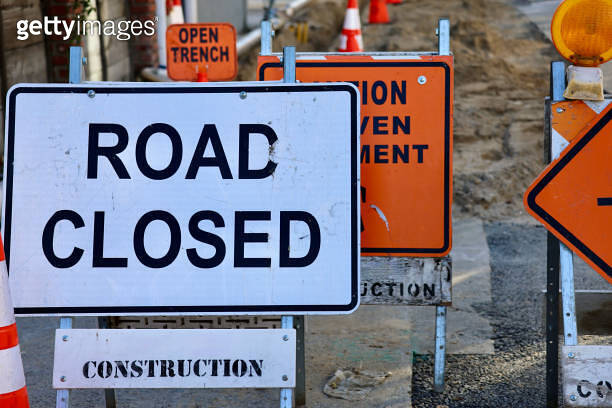 Road crew has placed warning signs around the open trench 이미지 ...