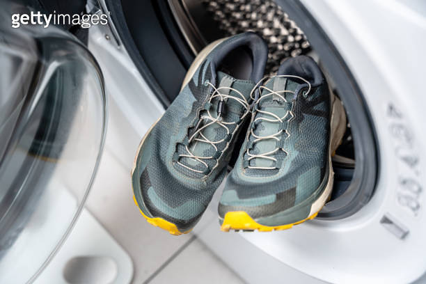 Sports and footwear hygiene and care. Trail running shoes inside of the ...