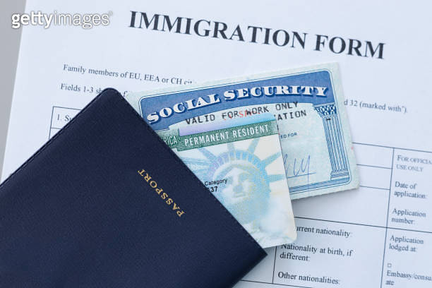 United States passport, social security card and permanent resident ...