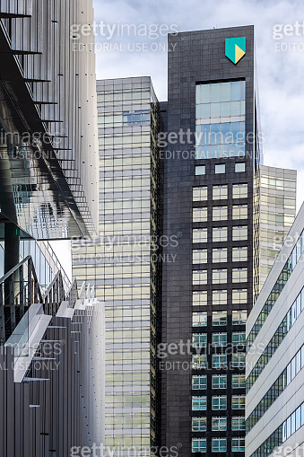 Glass tower buildings in the financial center of the city of Amsterdam ...