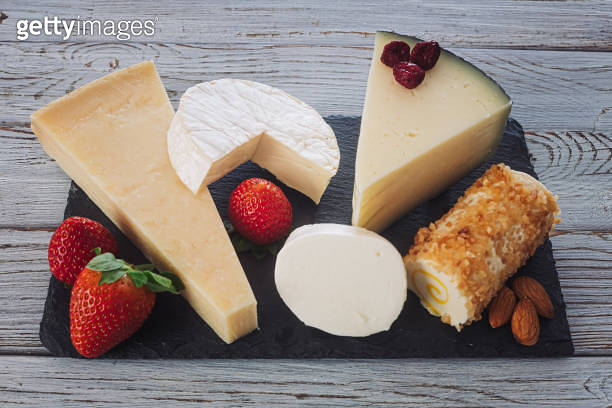 Set or assortment of cheeses. Parmesan, mozzarella, Spanish goat cheese ...