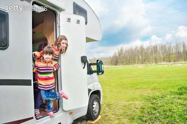 Kids in camper (rv) have fun, family travel in motorhome on holiday ...