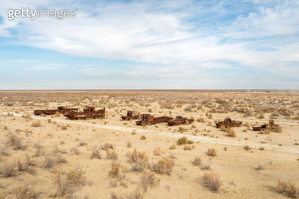 rusty ship at bottom of former Aral Sea. The dried-up sea in an ...