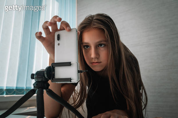 The Girl Carries In Front Of The Camera Records The Stories Teenage Girl Filming Video Of