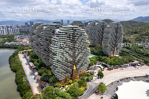 Sanya, Hainan, China. House trees on the streets of the city. top view ...