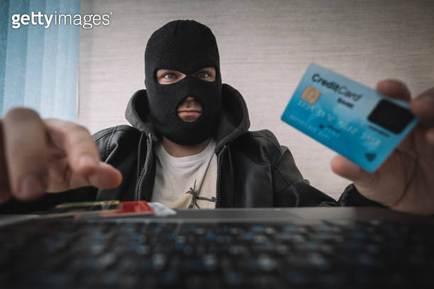 Man in robber mask uses internet, bank account and credit facilities ...